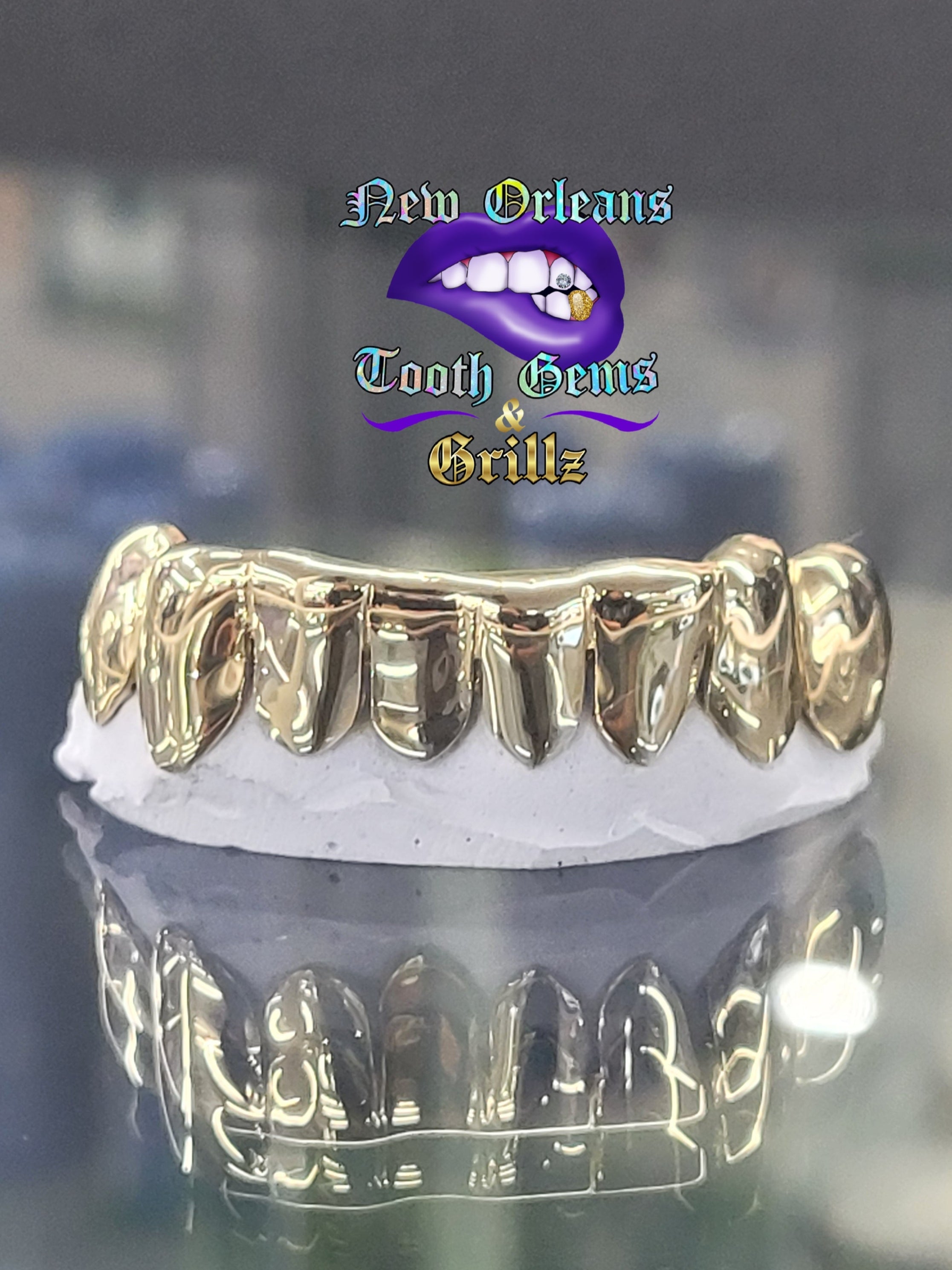 Custom Grillz – New Orleans Tooth Gems & Grillz