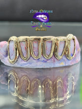 Custom Grillz – New Orleans Tooth Gems & Grillz